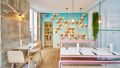 A Restaurant In Paris That Serves Tasty Burgers And Colorful Interiors ...